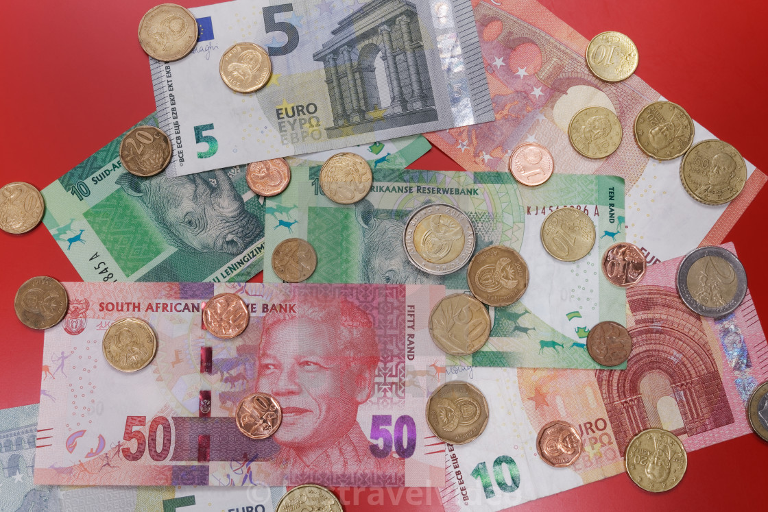 South Africa Rand Money Coins With Euro Banknotes Top View License South Africa Rand Money Coins With Euro Banknotes Top View License